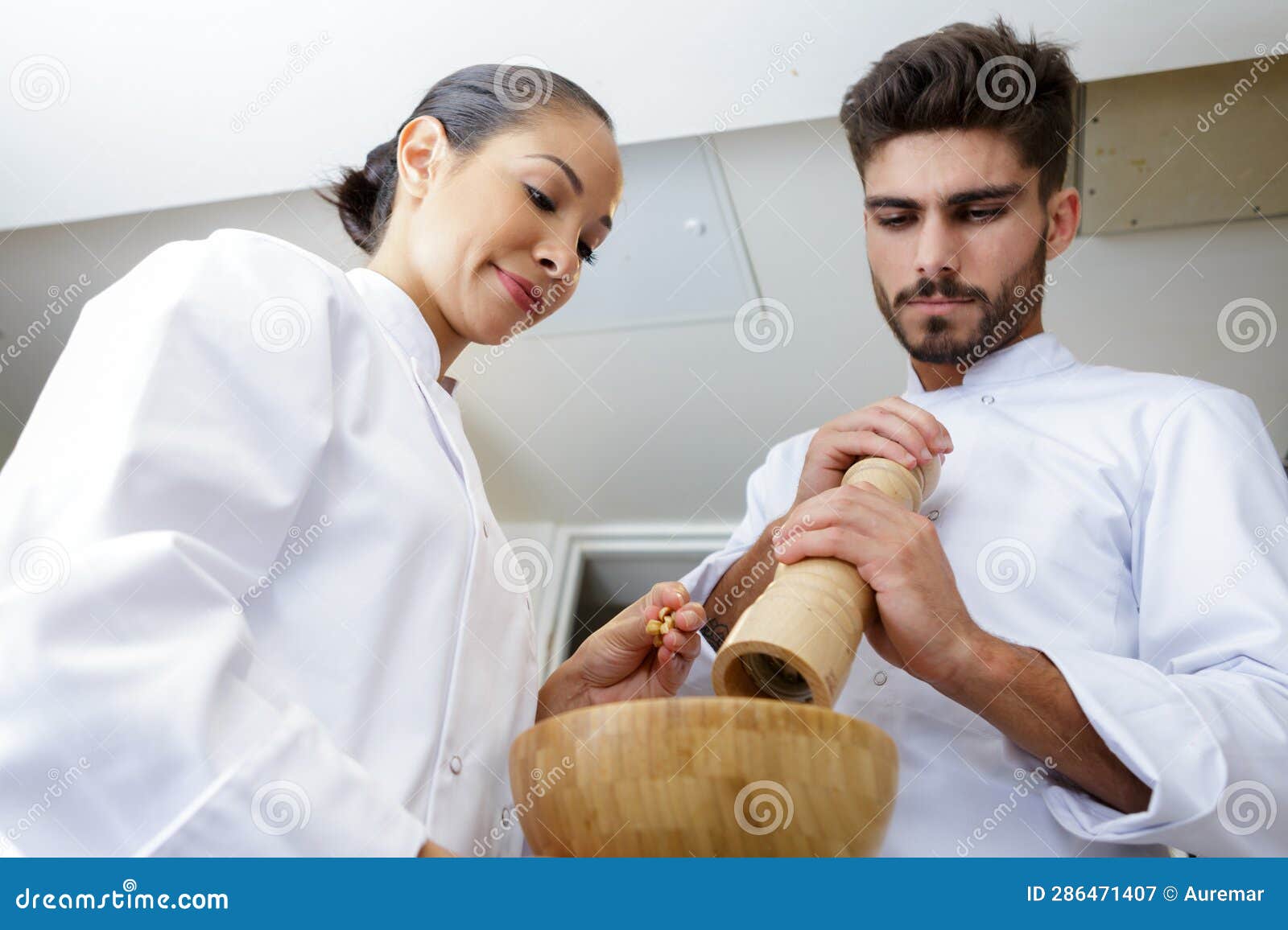 Low-angle View Chef Using Wooden Pepper Mill Stock Image - Image of ...