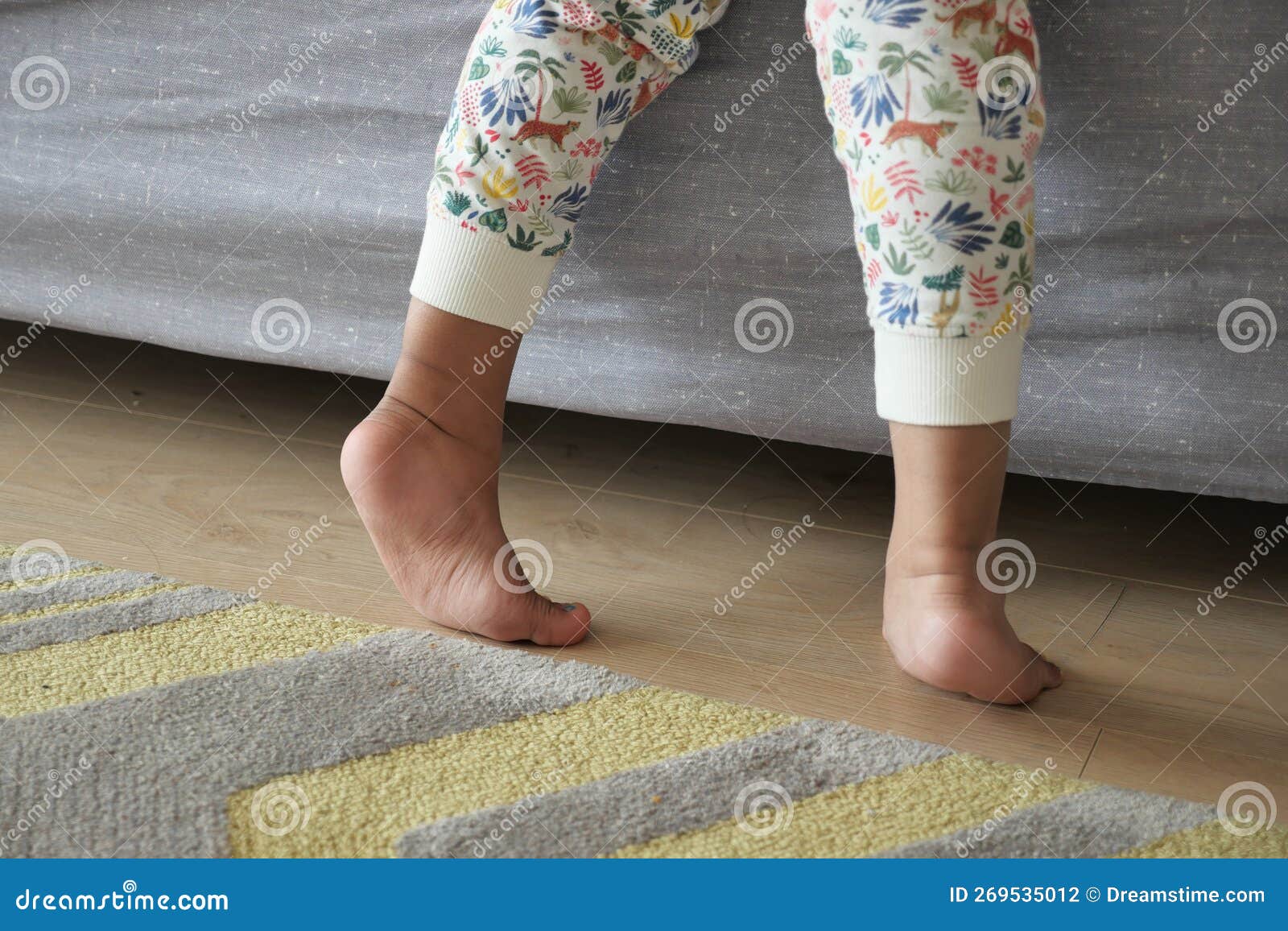 Low Angle View of a Child Walking on Tiptoes Stock Photo - Image of ...