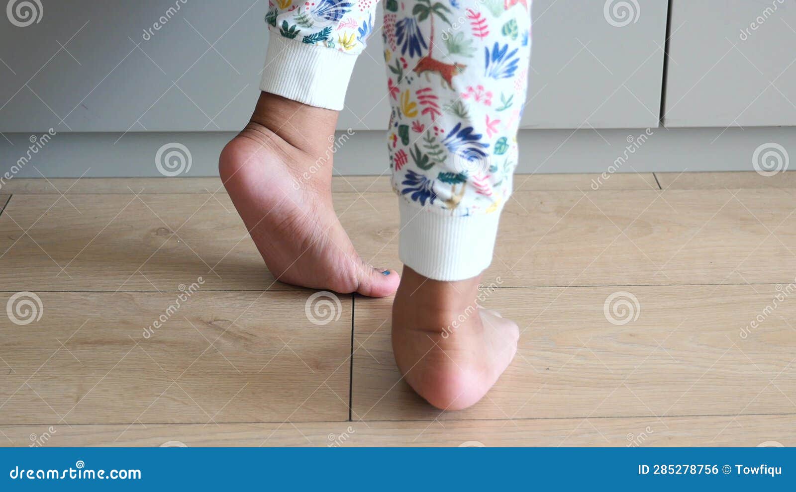 Low Angle View of a Child Walking on Tiptoes Stock Footage - Video of ...