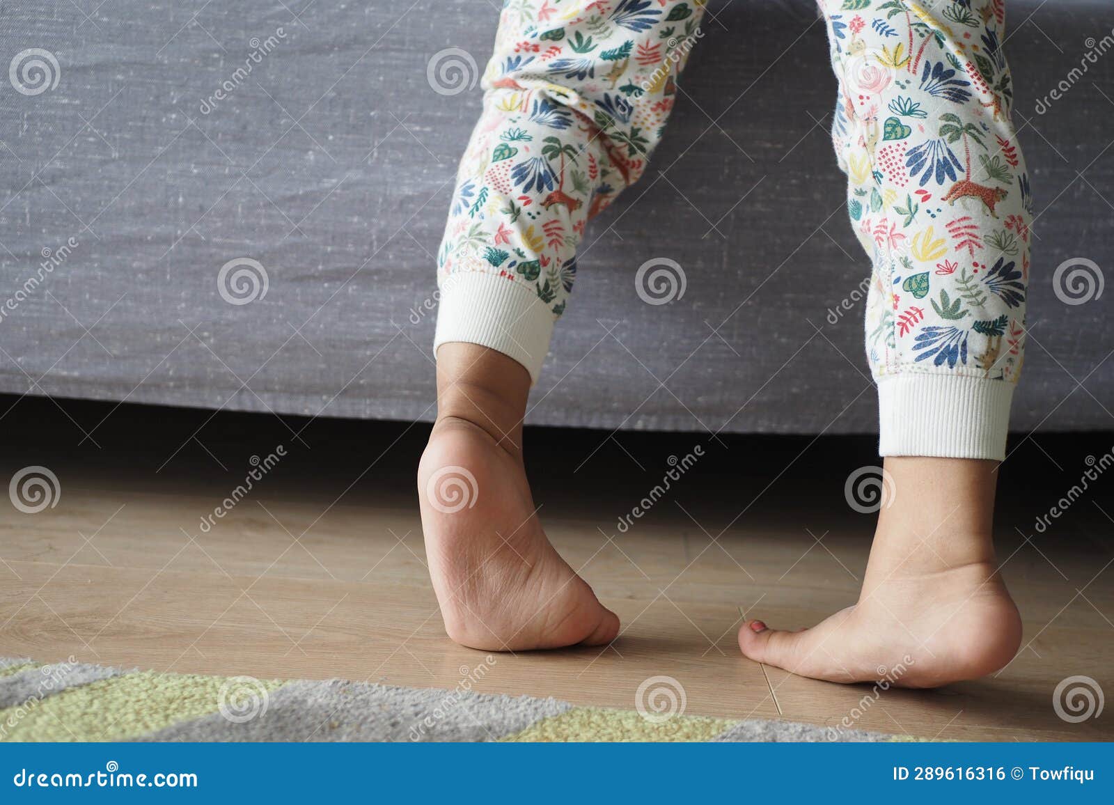 Low Angle View of a Child Walking on Tiptoes Stock Photo - Image of ...