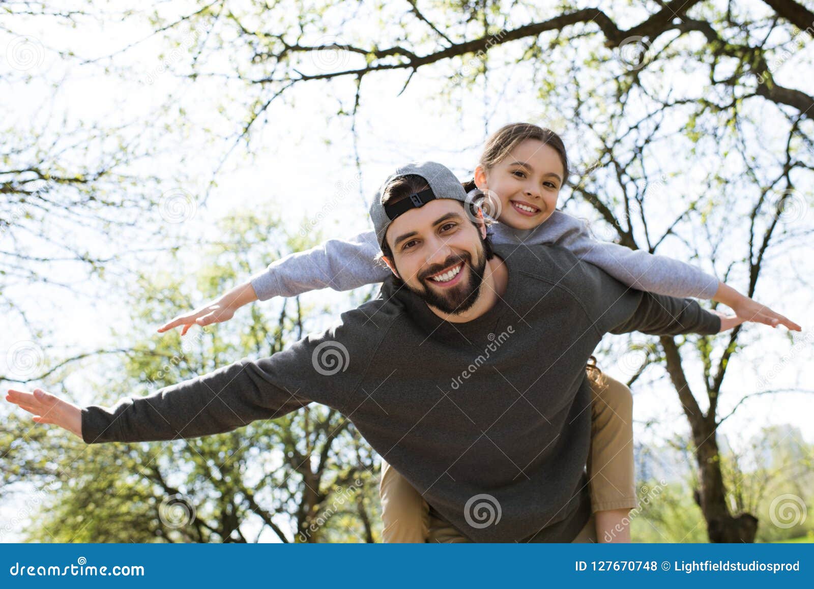 Low Angle View of Daughter on Father Back Stock Photo - Image of daddy ...