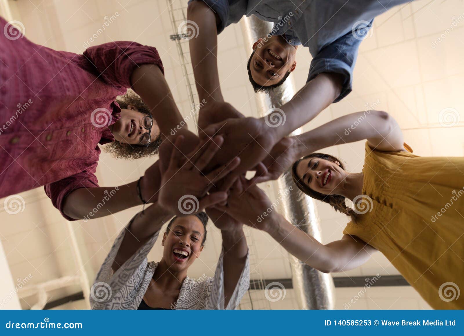 Business Colleagues Forming Hand Stack in Office Stock Image - Image of ...