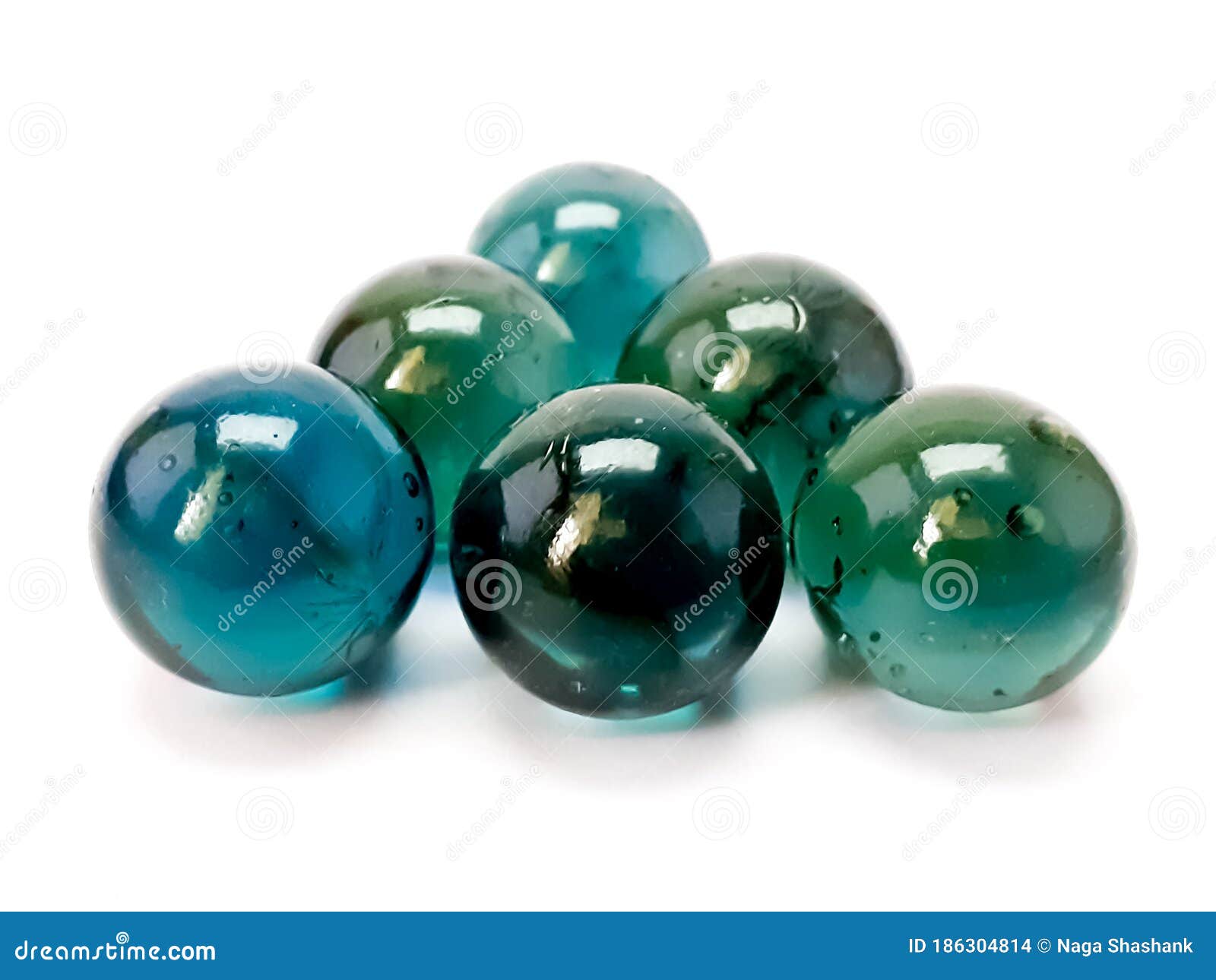 Low Angle View of Green Marbles in Triangle Shape Stock Photo - Image ...