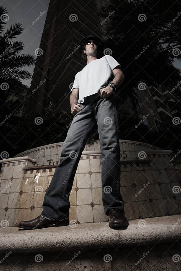 Low Angle View of a Handsome Man Stock Image - Image of young, jeans ...