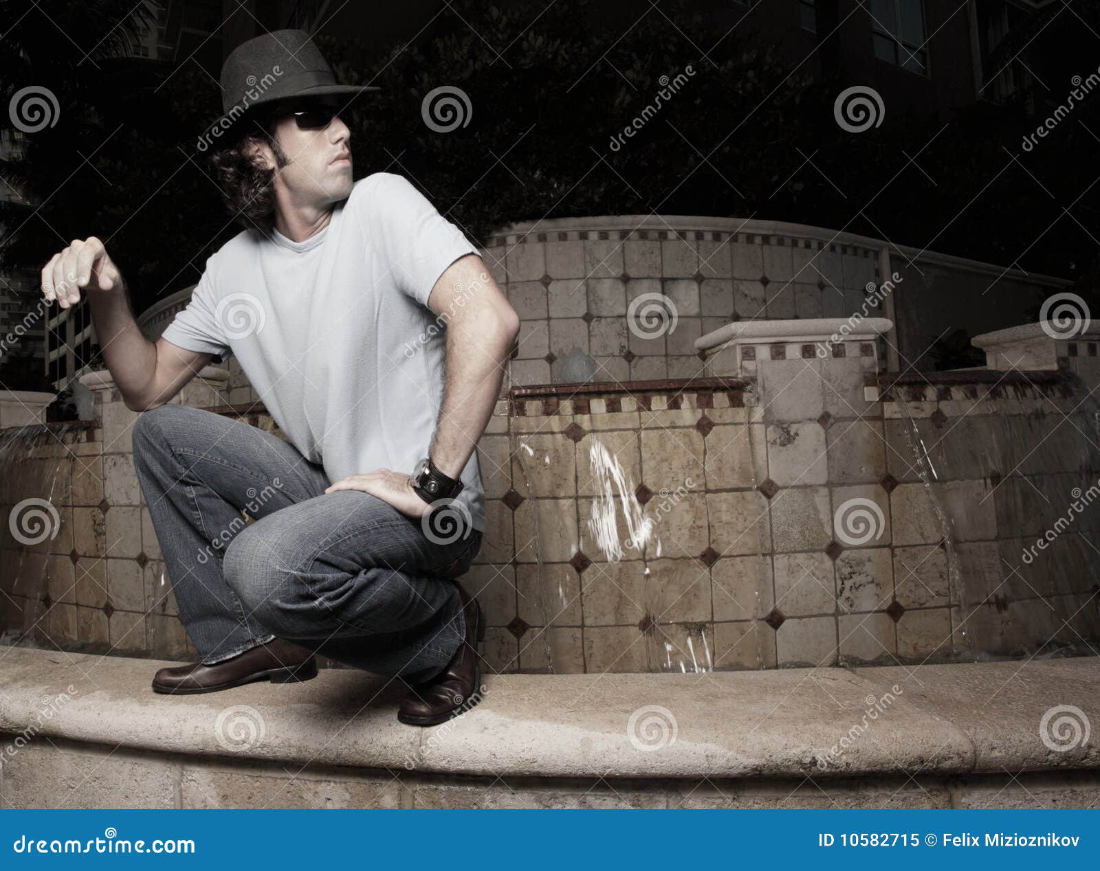Low Angle View of a Handsome Man Stock Image - Image of modern, fashion ...