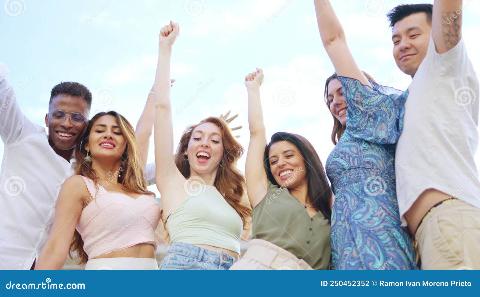 Happy Group of Friends Raising the Arms while Smiling Stock Footage ...