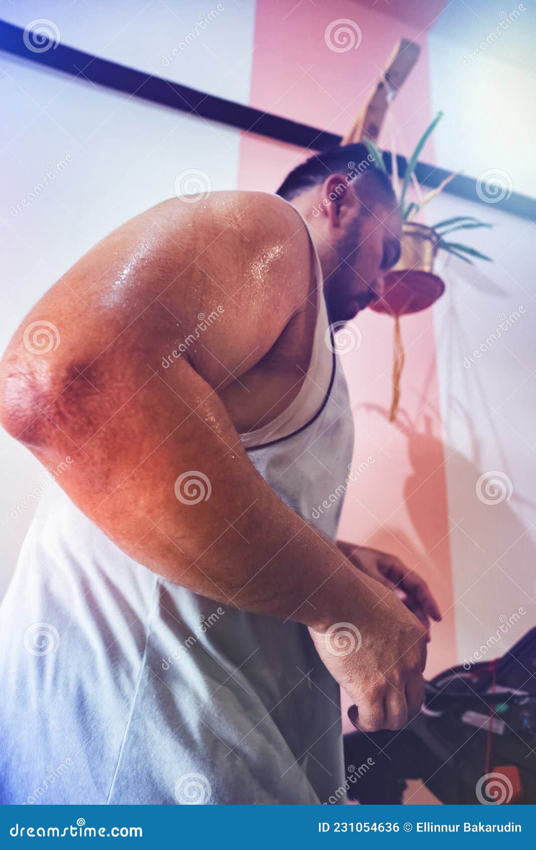 Low Angle View of a Matured Man Sweating while Running on a Treadmill ...
