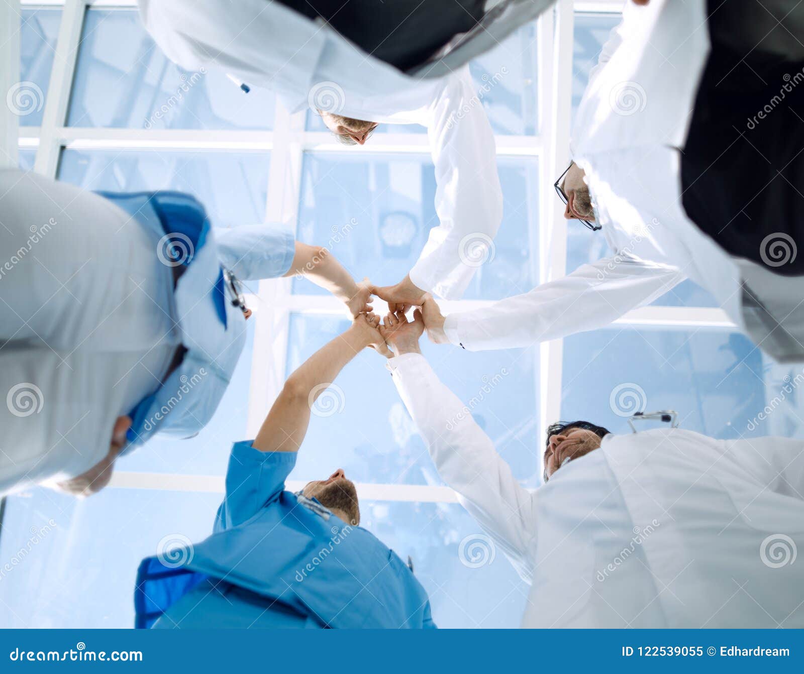 Doctors and Nurses in a Medical Team Stacking Hands Stock Image - Image ...