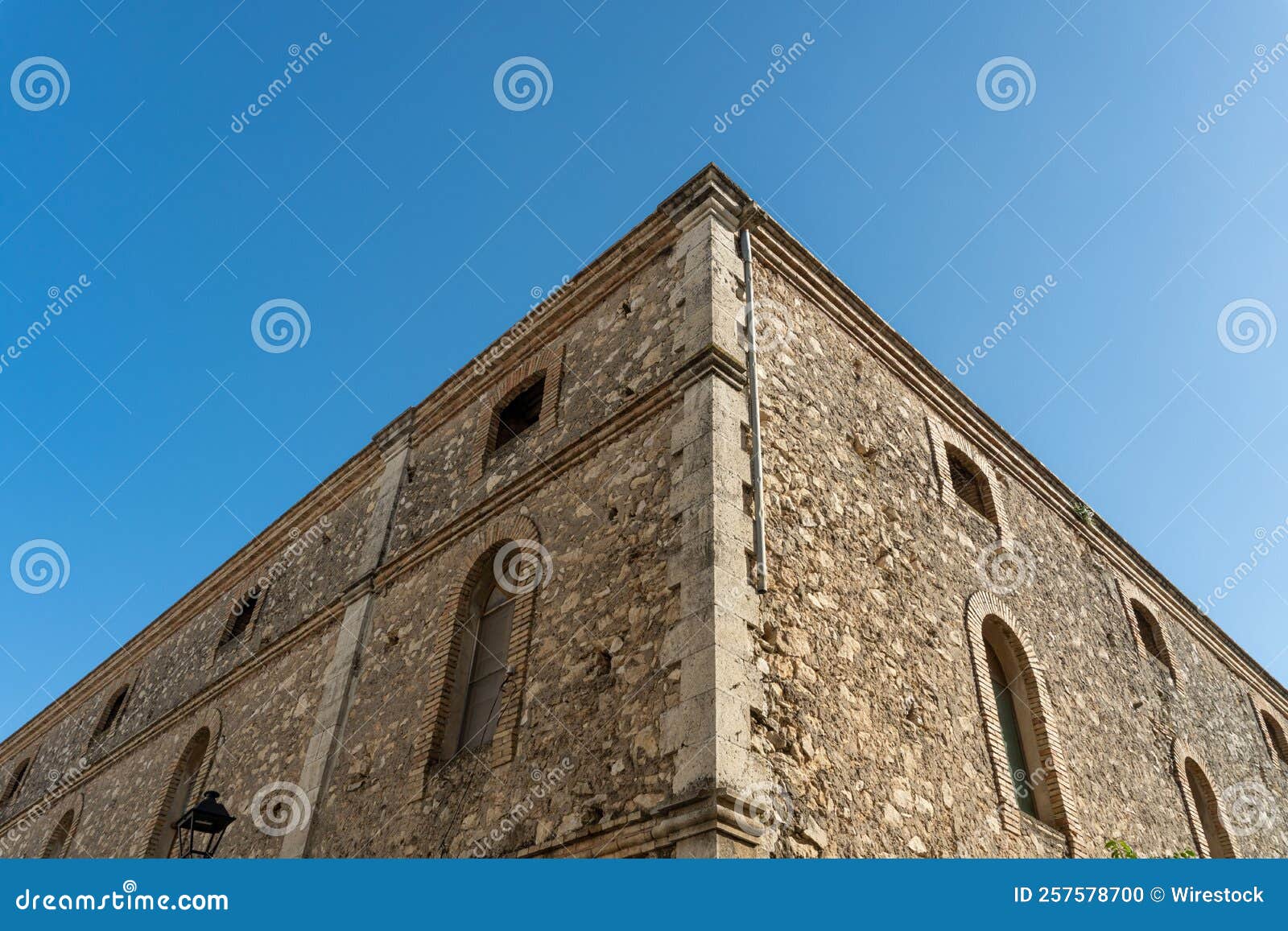 Low-angle View of a Medieval Building Facade Walls Under the Blue Sky ...
