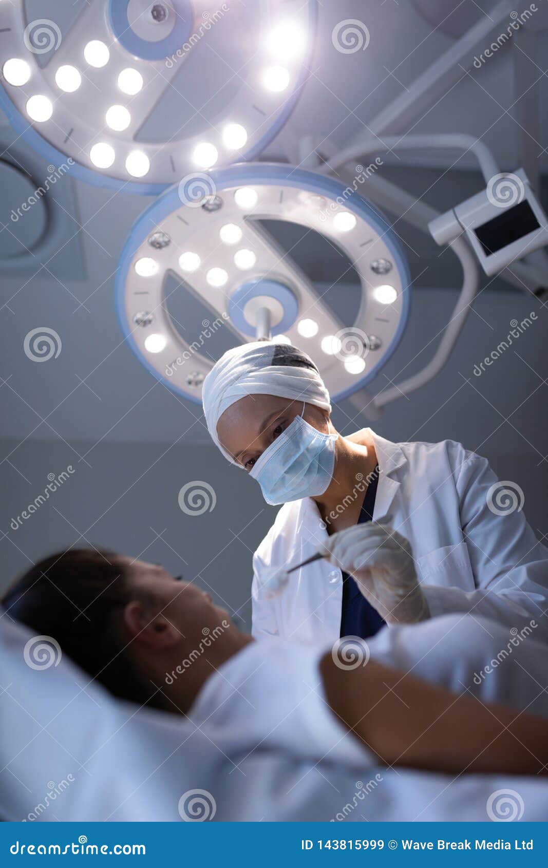 Female Dentist Examining Patient in Clinic Stock Image - Image of ... Female Dentist Examining Patient in Clinic Stock Image - Image of ...