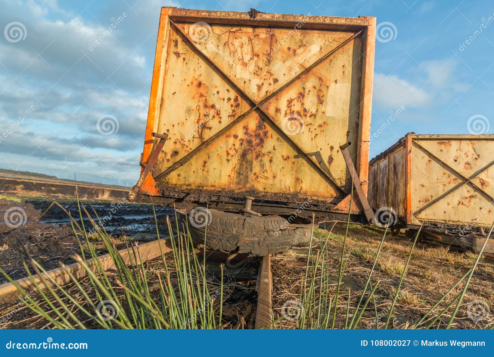 Low Angle View of an Old Rusty Mine Cart for Peat Mining Against Stock ...