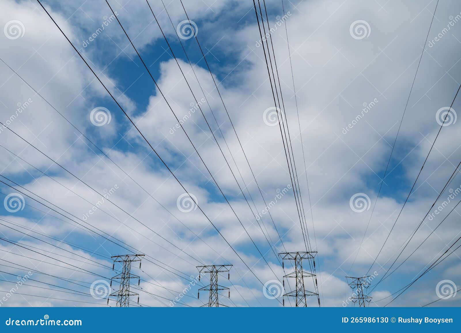 Low Angle View of Pylons with Cabling Running in Line Stock Photo ...