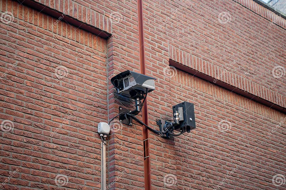 Low-angle View of Security Cameras Installed on the Exterior Wall of a ...