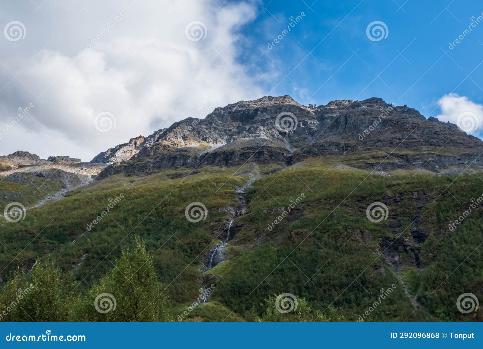 Low Angle View of Steep Mountain Side. Waterfall in the Middle Stock ...