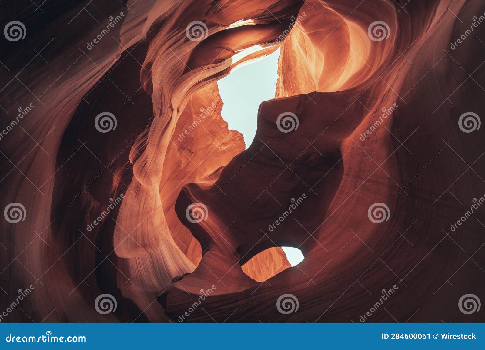 Low-angle View of the Sun Illuminating the Rugged Sandstone Formations ...