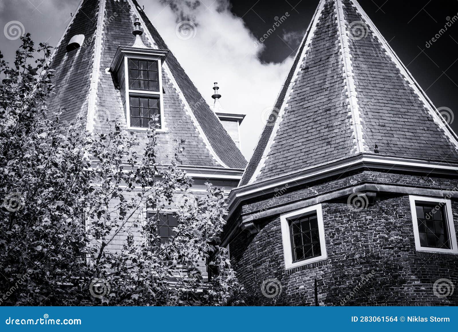 Low Angle View of Two Brick Towers Stock Photo - Image of roof ...