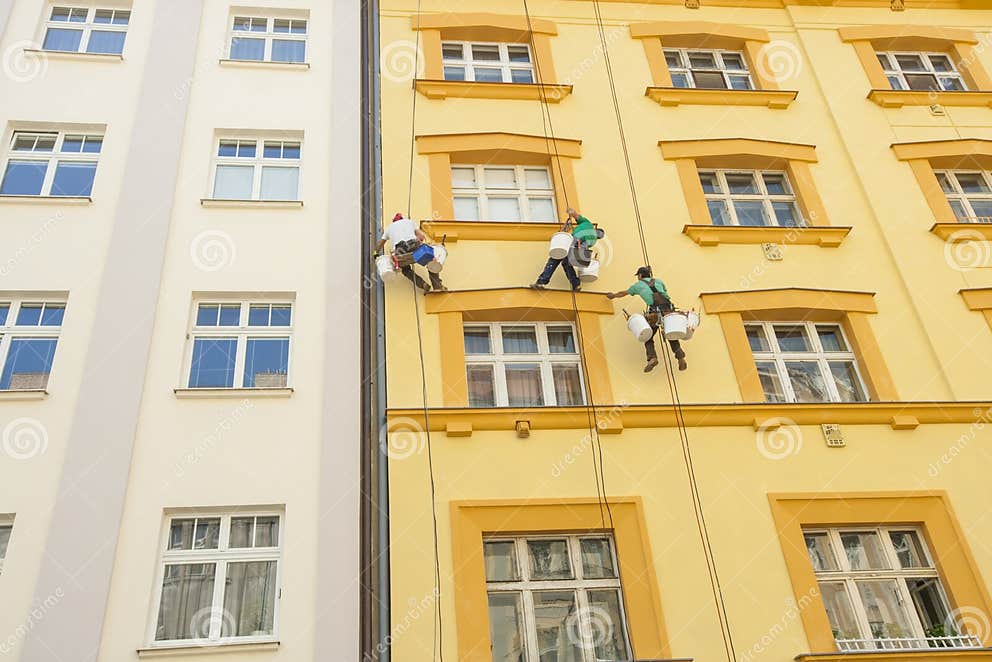 Low Angle View of Window Washers Hanging Outside Building Editorial ...