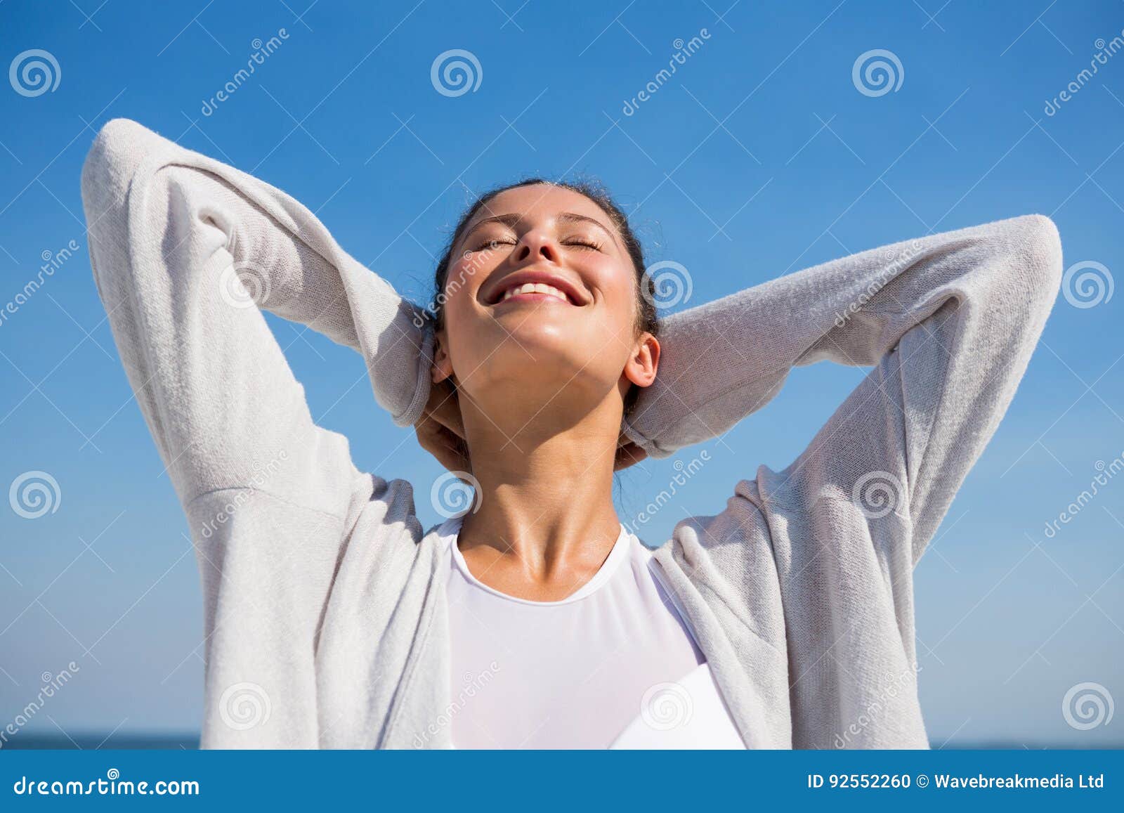 Low Angle View of Woman with Hands Behind Head Stock Photo - Image of ...