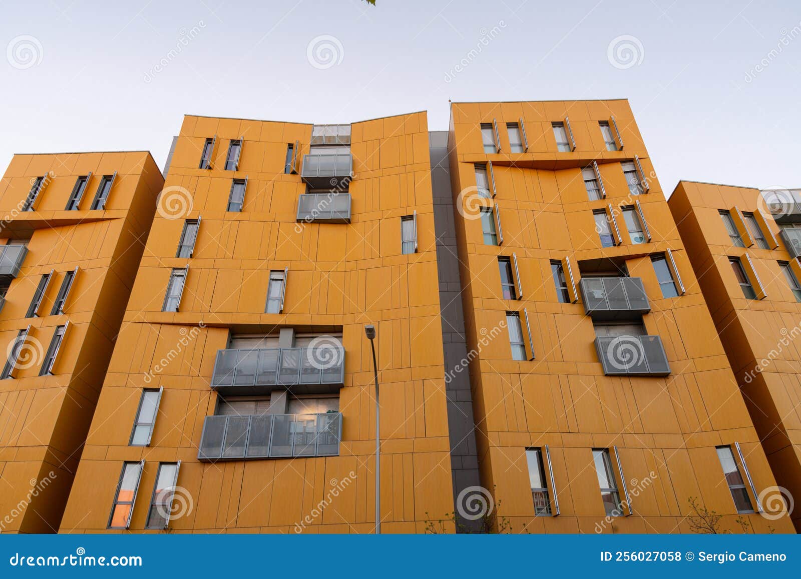 Yellow Facade of a Building from Below Stock Photo - Image of ...