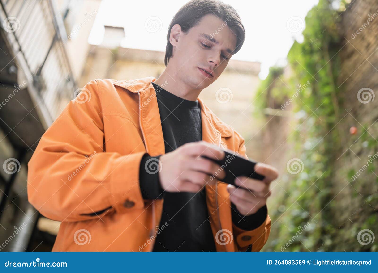 Low Angle View of Young Man Stock Image - Image of terrace, building ...