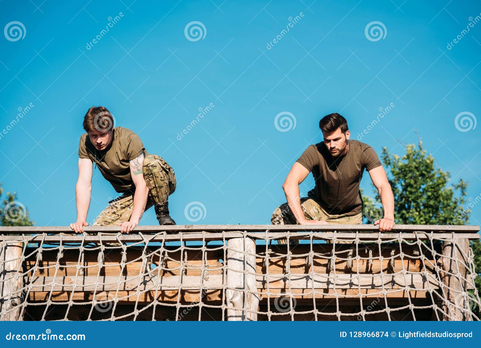 Low Angle View of Young Soldiers Practicing during Obstacle Run Stock ...