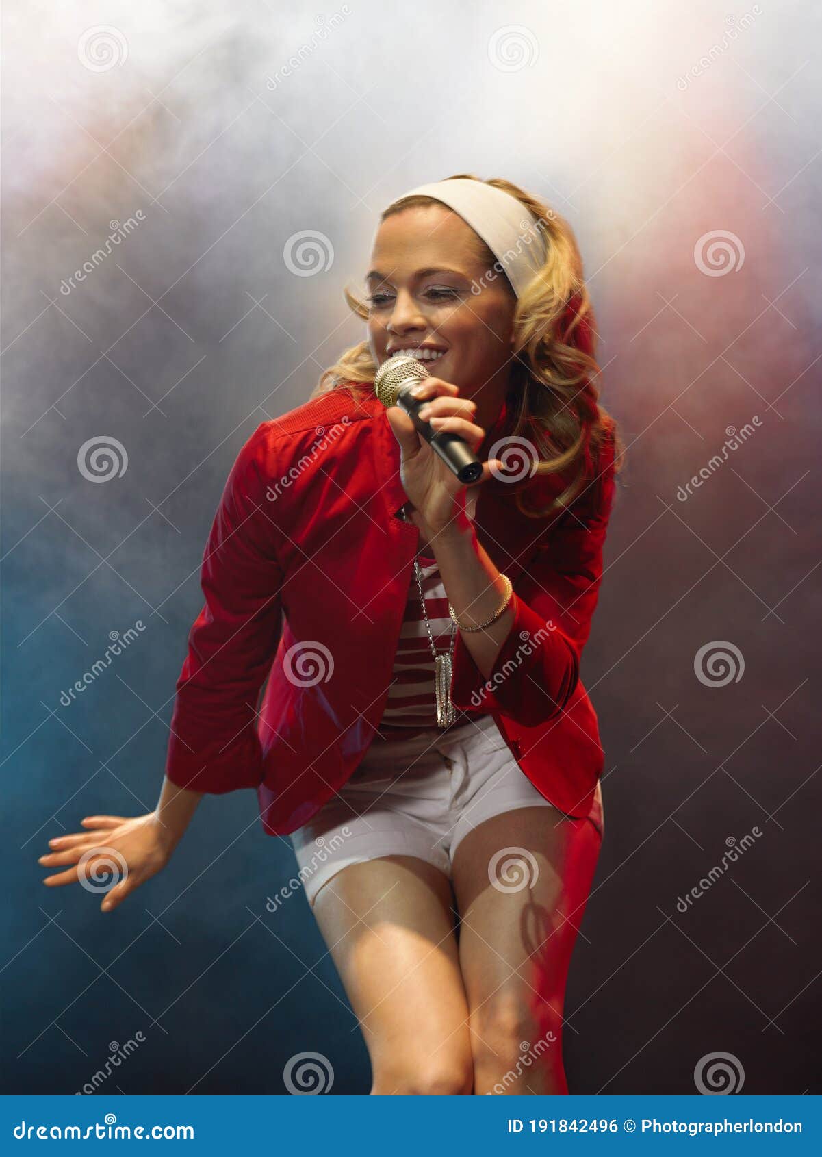 Woman Singing in Concert on Stage in Front of Adoring Fans Low Angle ...