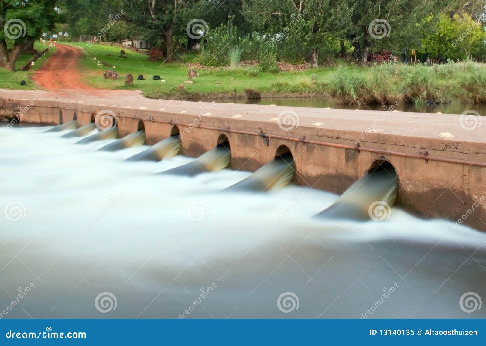 Low bridge with water stock image. Image of bridge, river - 13140135