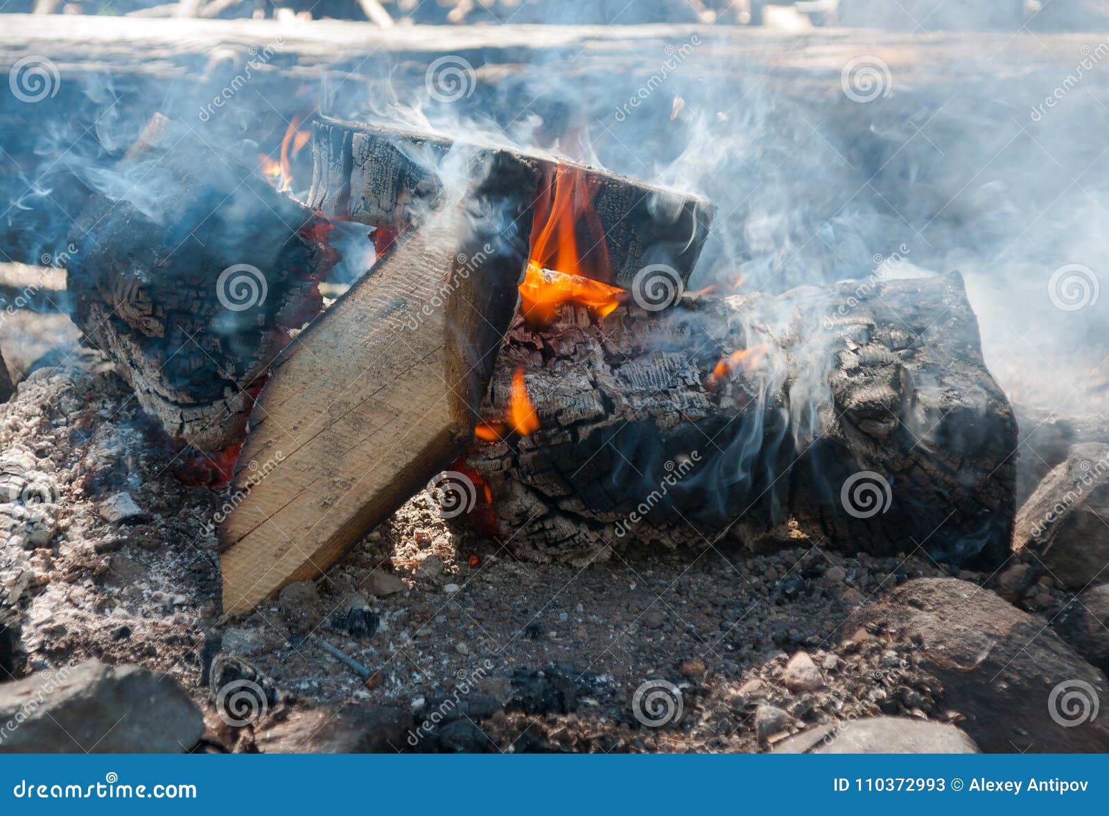 Low-burning Fire Surrounded by Stones Stock Image - Image of lowburning ...