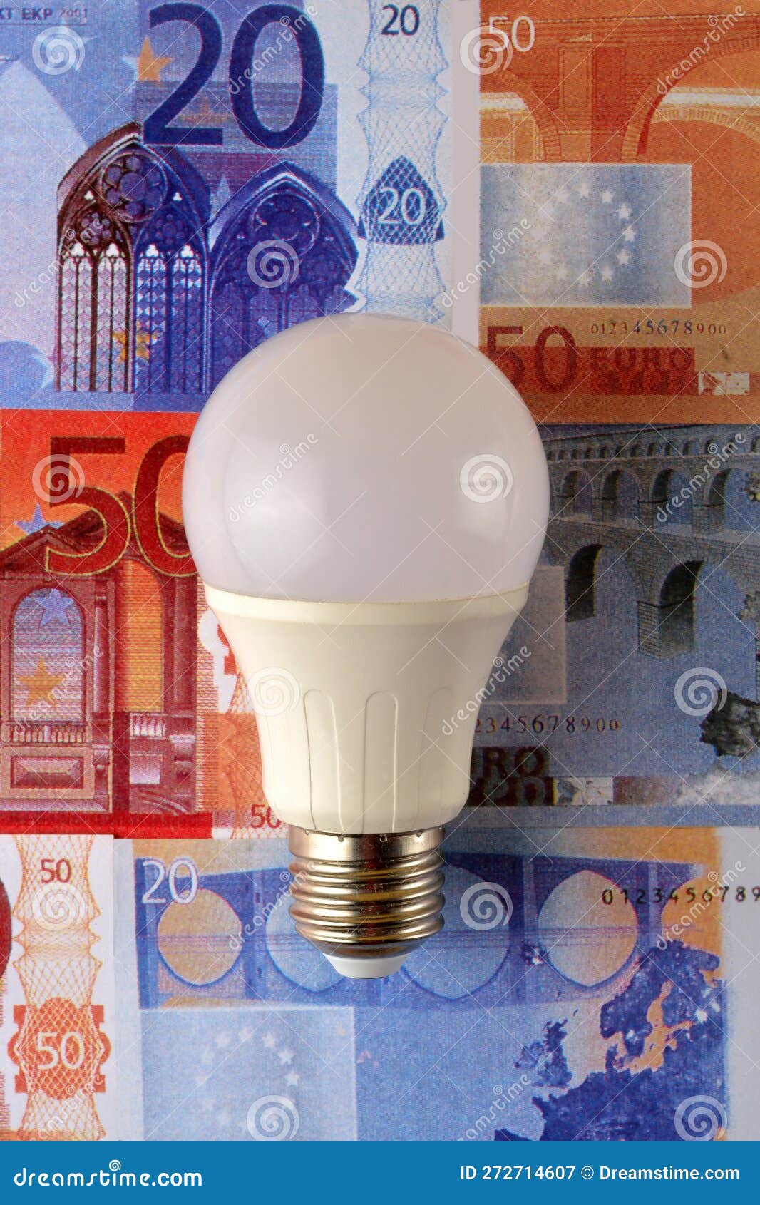 A Low Consumption Led Light Bulb on a Background of Euro Banknotes ...