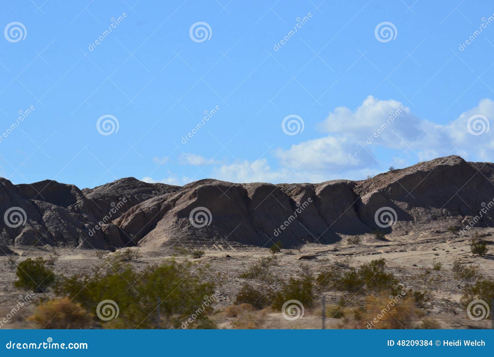 Low desert with mountains stock photo. Image of light - 48209384