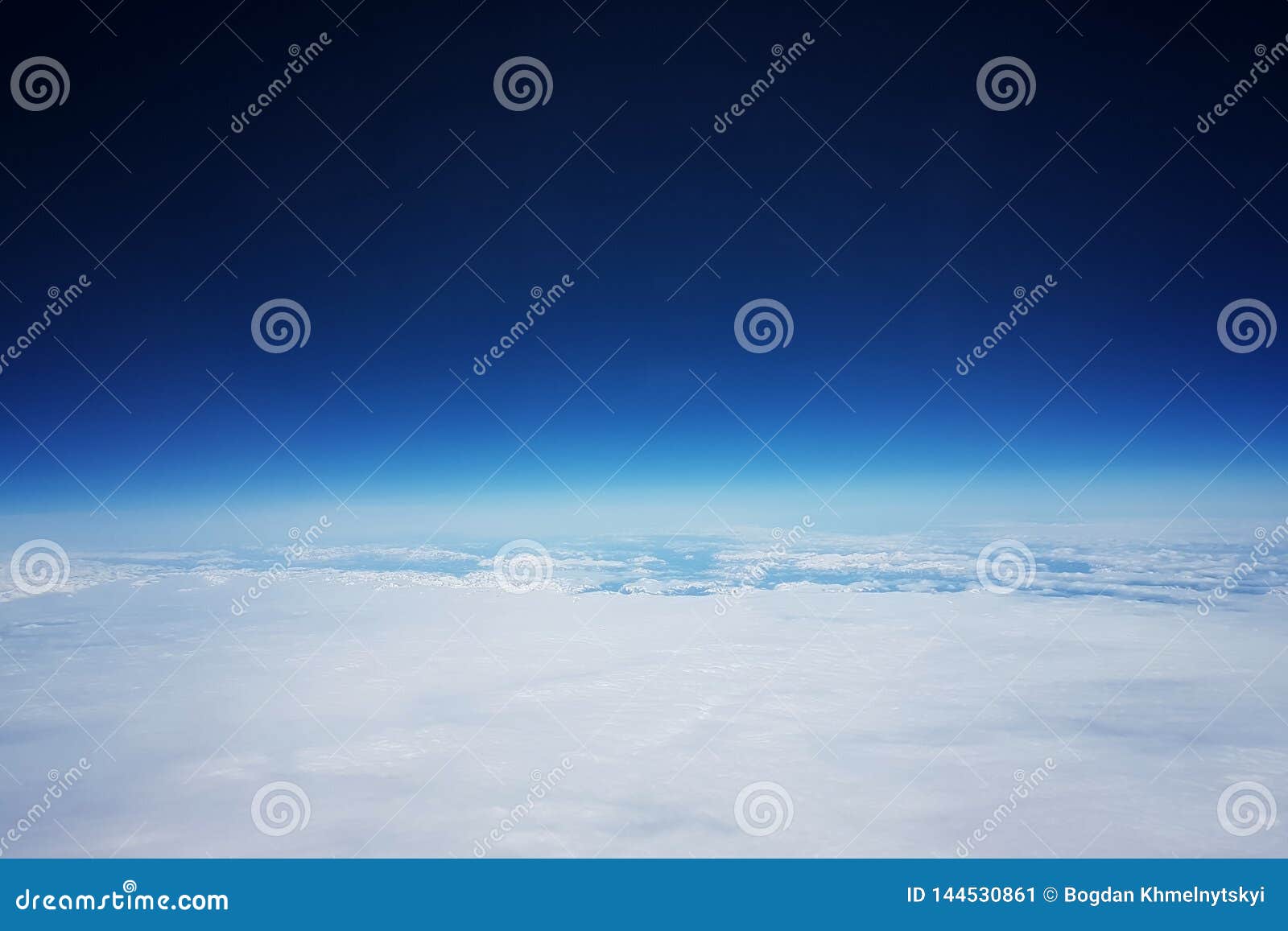 Low Earth Orbit - View of White Clouds and Mountains during the Flight ...