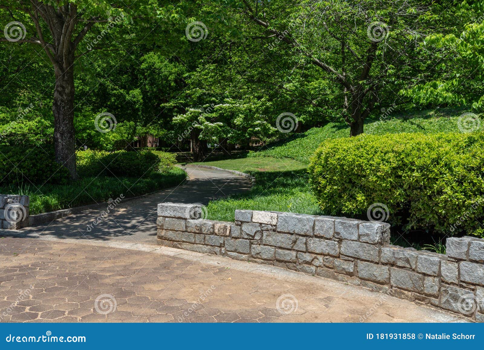 Low Granite Block Wall, Path through an Urban Park in Spring, Green ...