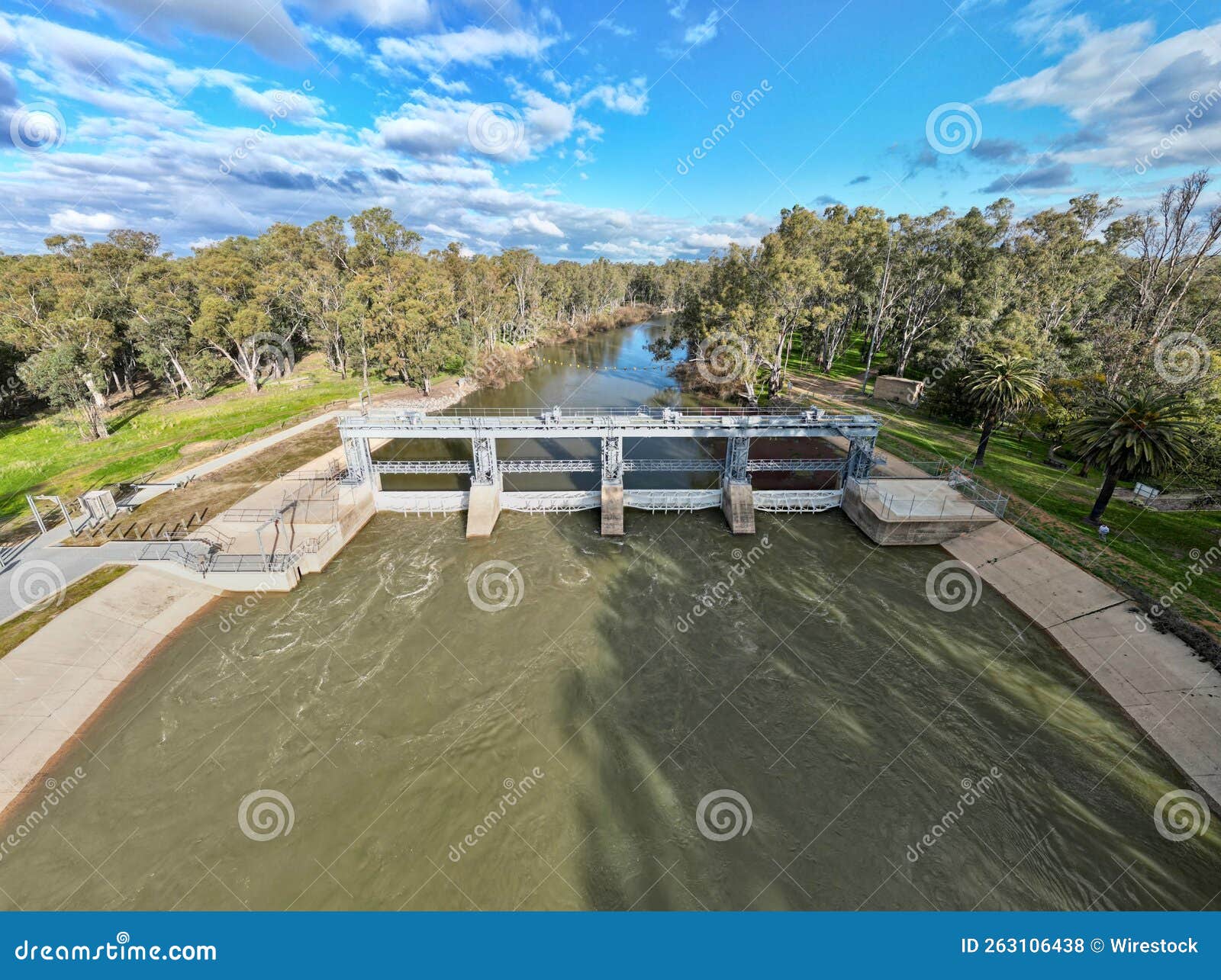 Low Head Dam on a River in the Park Stock Photo - Image of bridge ...