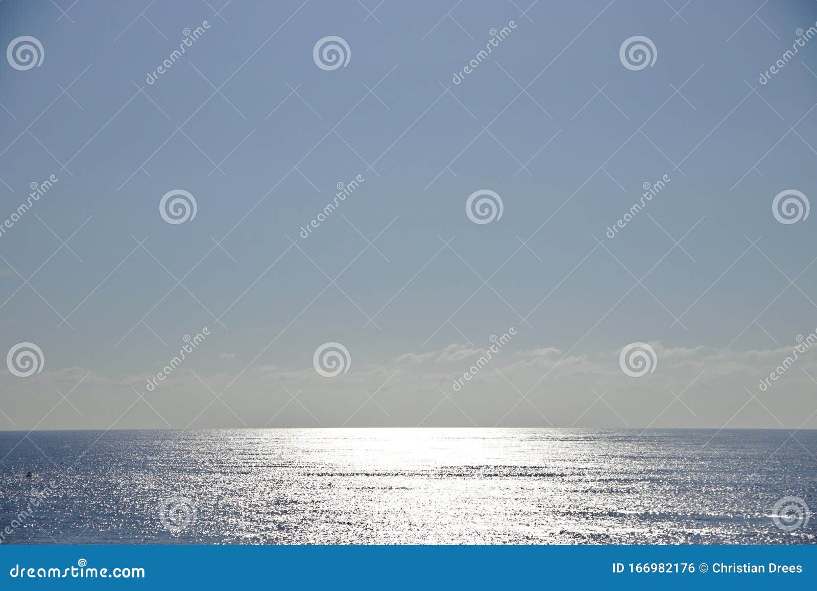 Low Horizon Over the Ocean with Reflections from the Sun Stock Photo ...