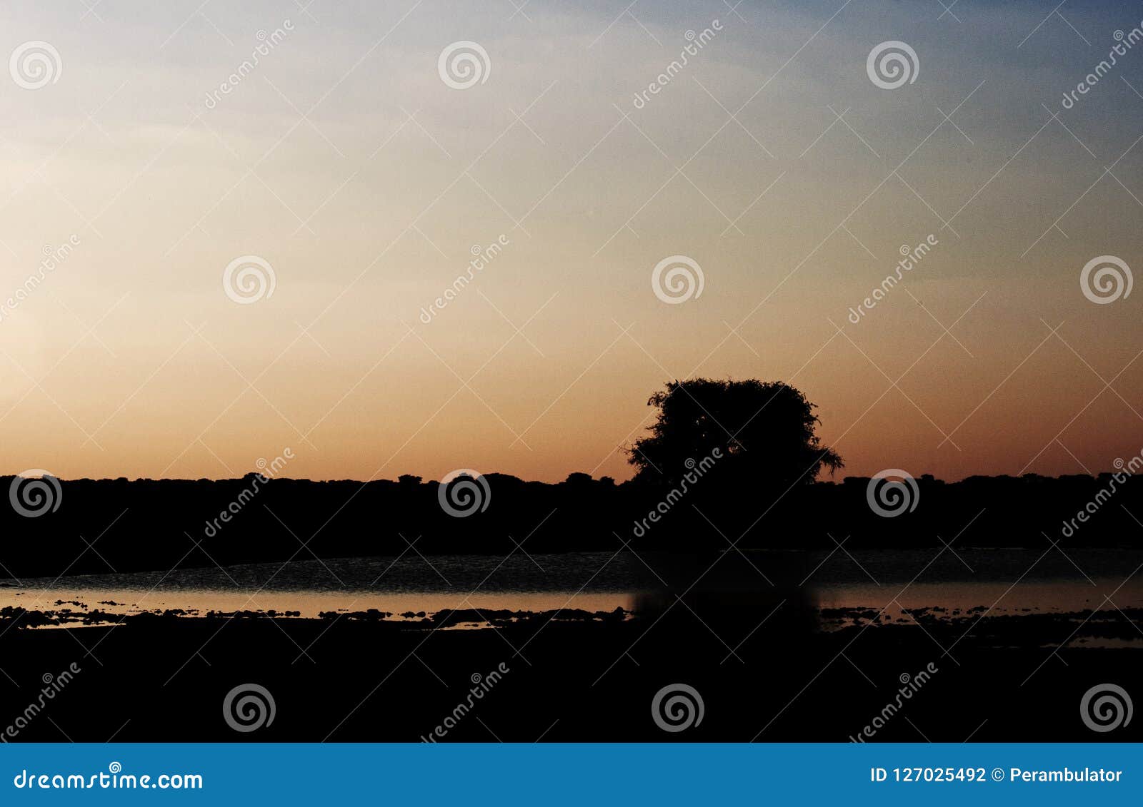 LOW KEY EFFECT on SUNSET OVER PAN of WATER Stock Photo - Image of ...