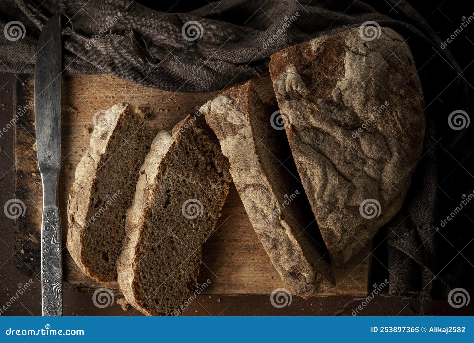 Low Key Food Photography. Black Rustic Bread on Dark Background Stock ...
