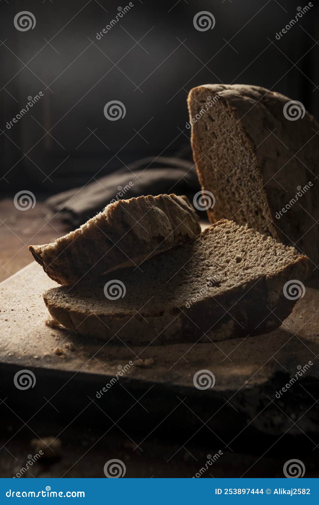Low Key Food Photography. Black Rustic Bread on Dark Background Stock ...