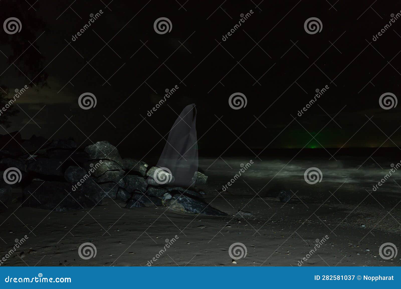 Low Key Image a Blur White Ghost on the Beach Stock Image - Image of ...