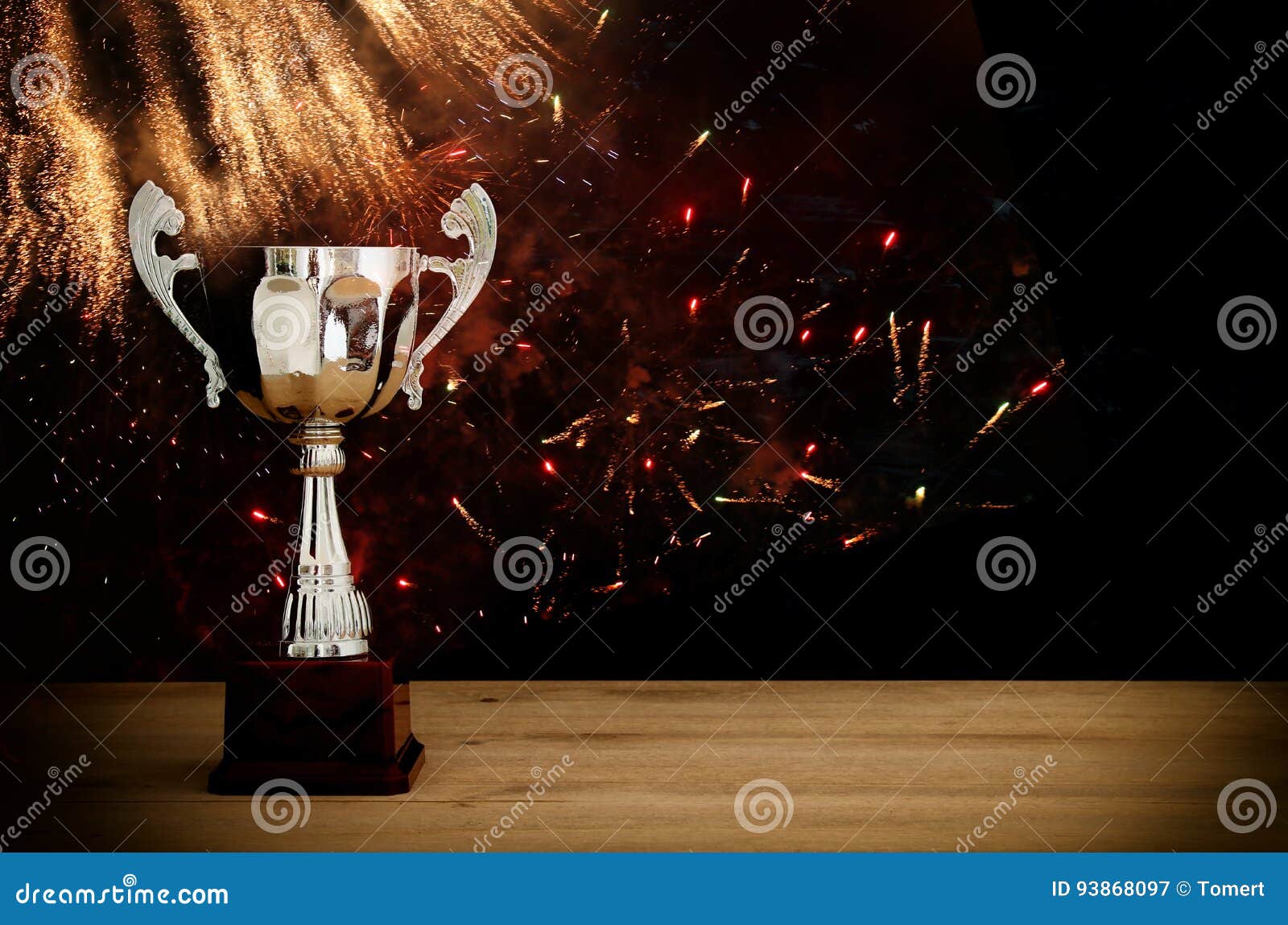 Low Key Image of Trophy Over Wooden Table and Dark Background Stock ...