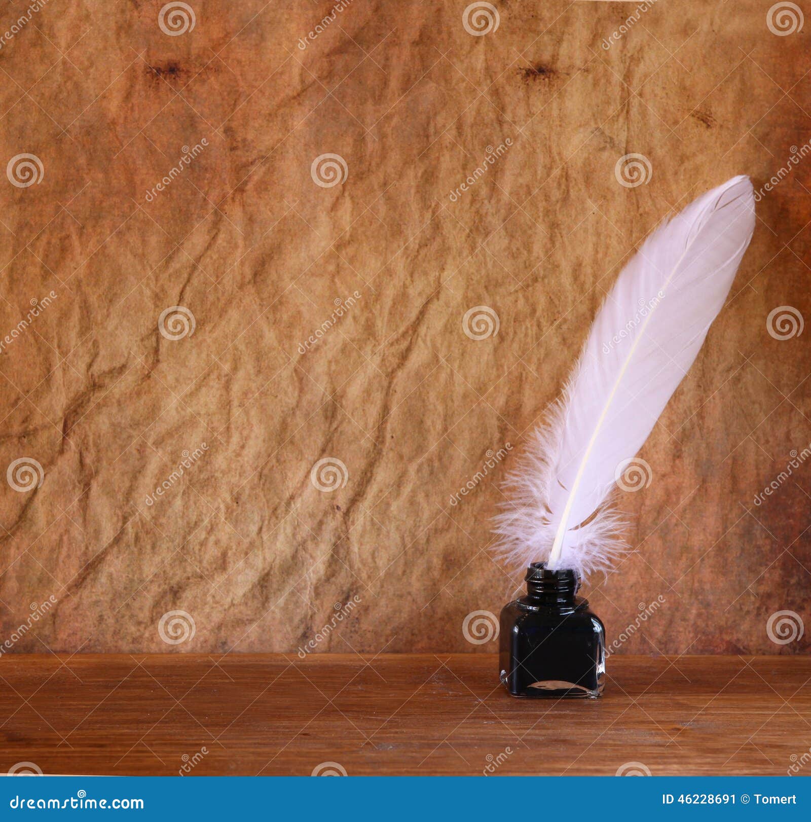 Low Key Image of White Feather and Inkwell on Old Wooden Table Stock ...