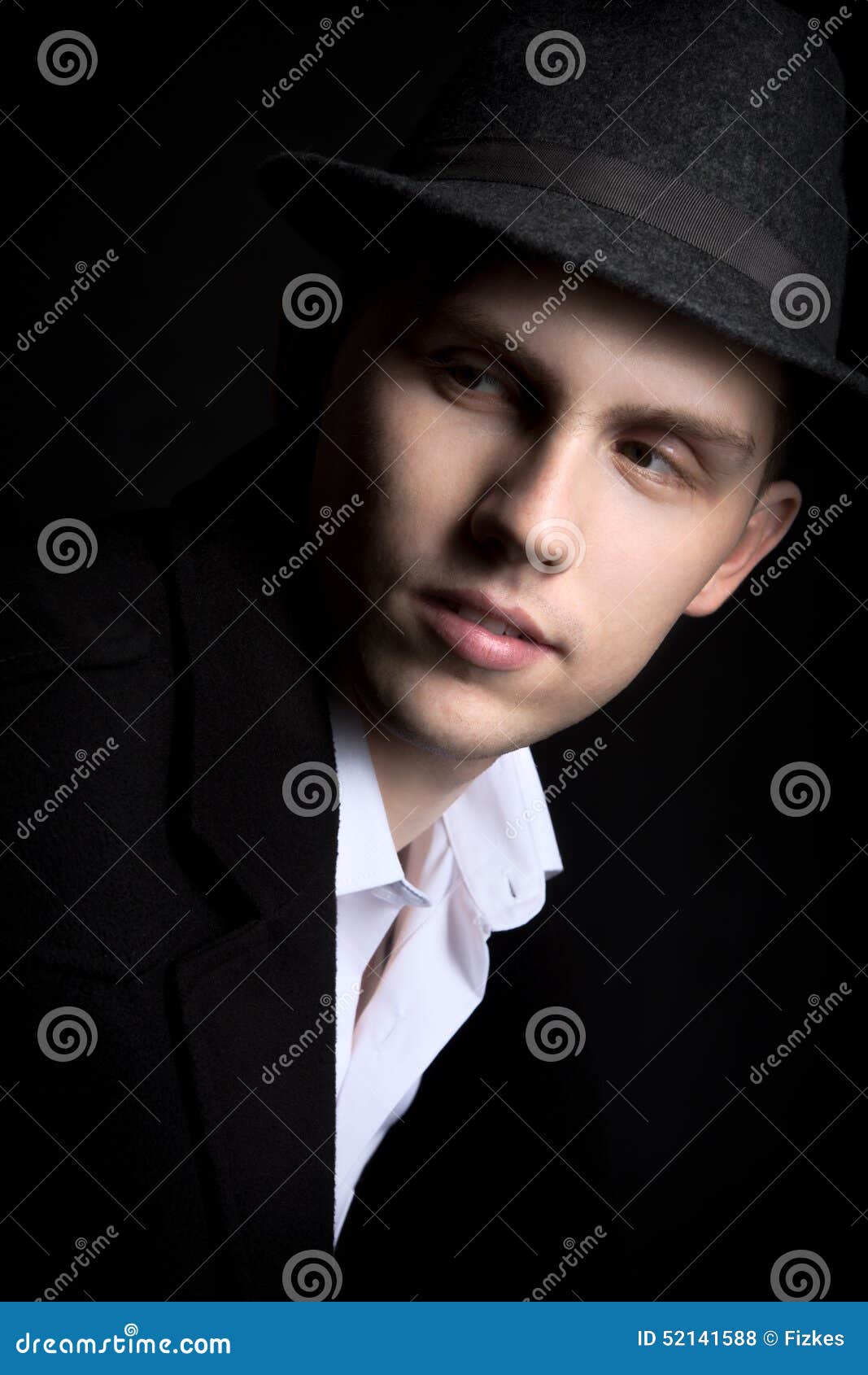 Low Key Shot of Young Man in Hat Stock Photo - Image of brutal ...