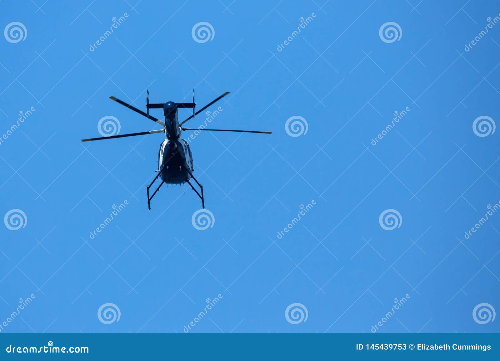 Low POV View of Underside of Helicopter in the Sky Stock Image - Image ...