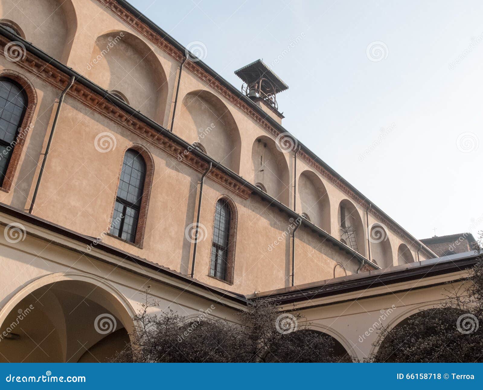 Low Rise Stone Building with Arches in Warm Sun Stock Photo - Image of ...