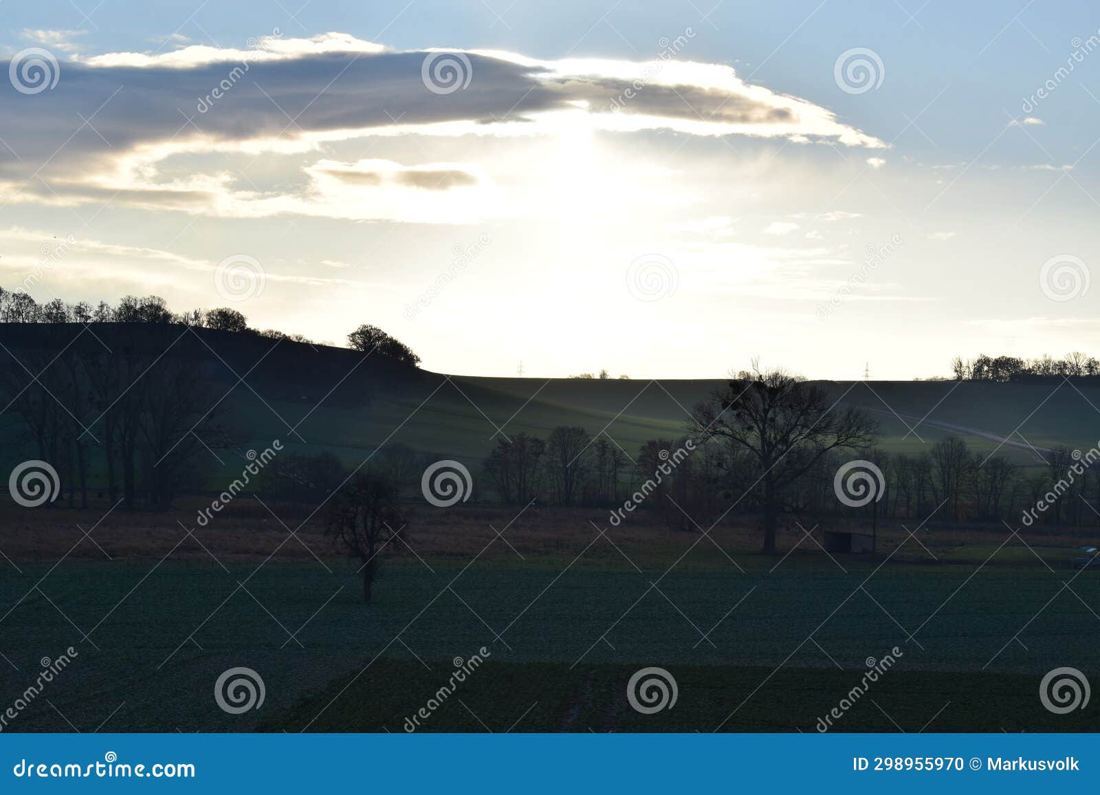 Low Rising Sun in Gray Clouds Stock Photo - Image of horizon, thür ...