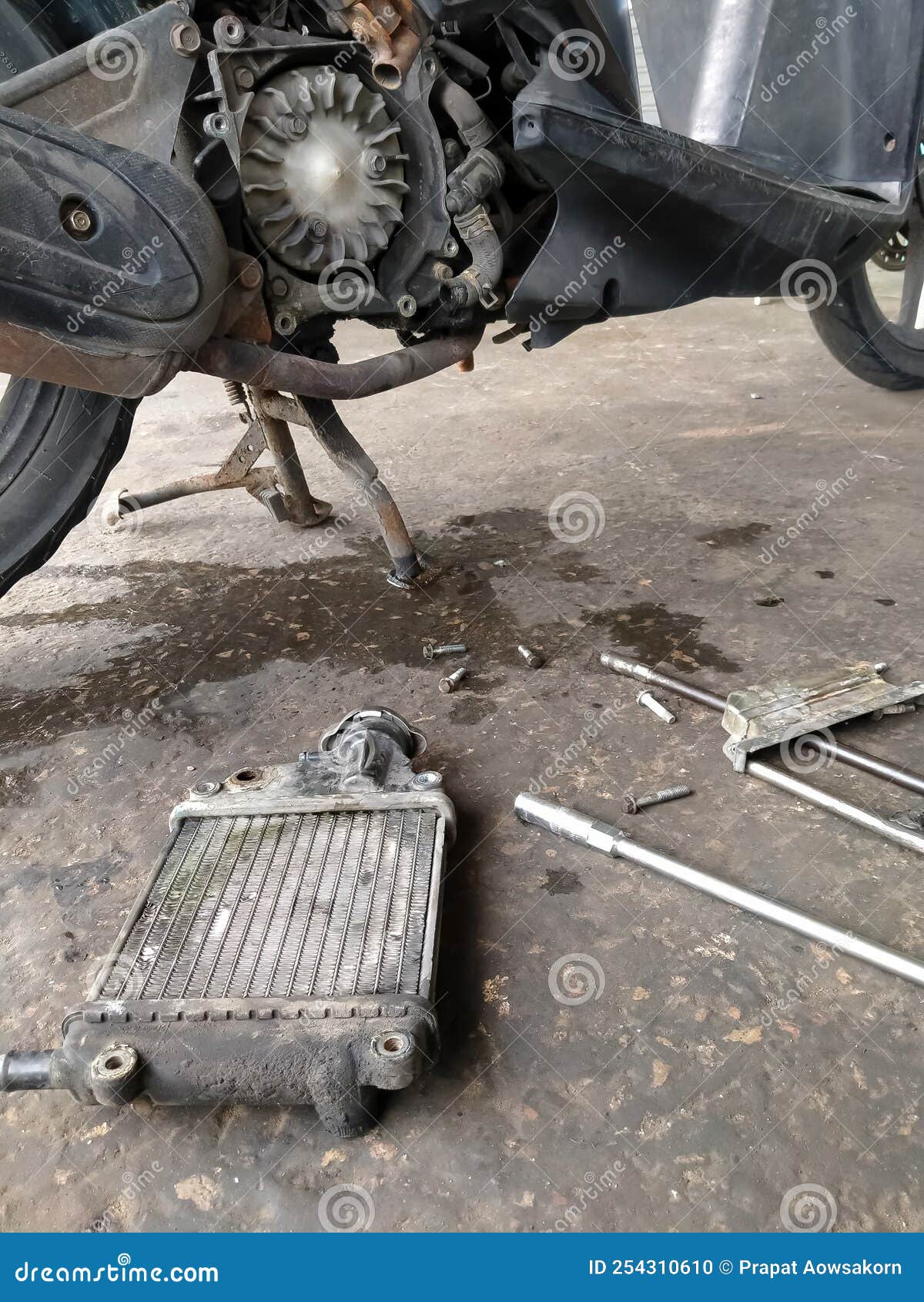 Low Section of the Old Motorcycle with Broken Radiator on the Floor ...
