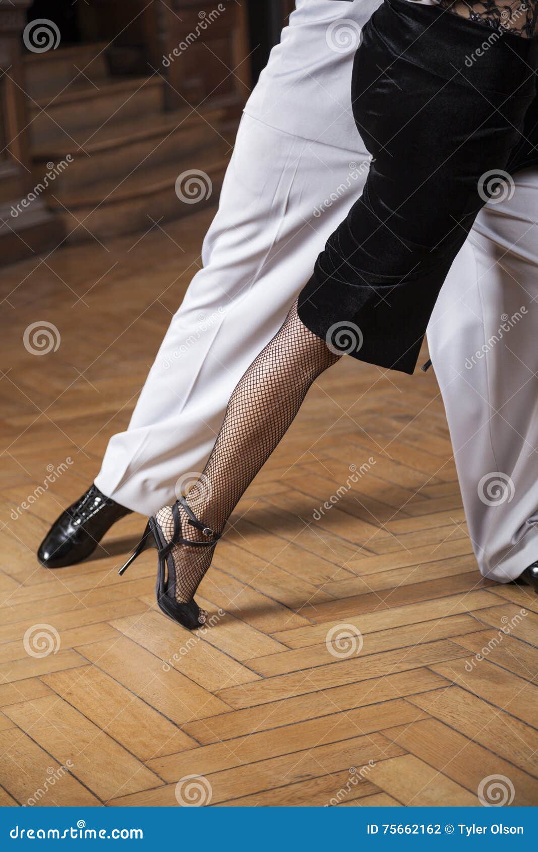 Low Section of Tango Dancers Performing on Hardwood Floor Stock Photo ...