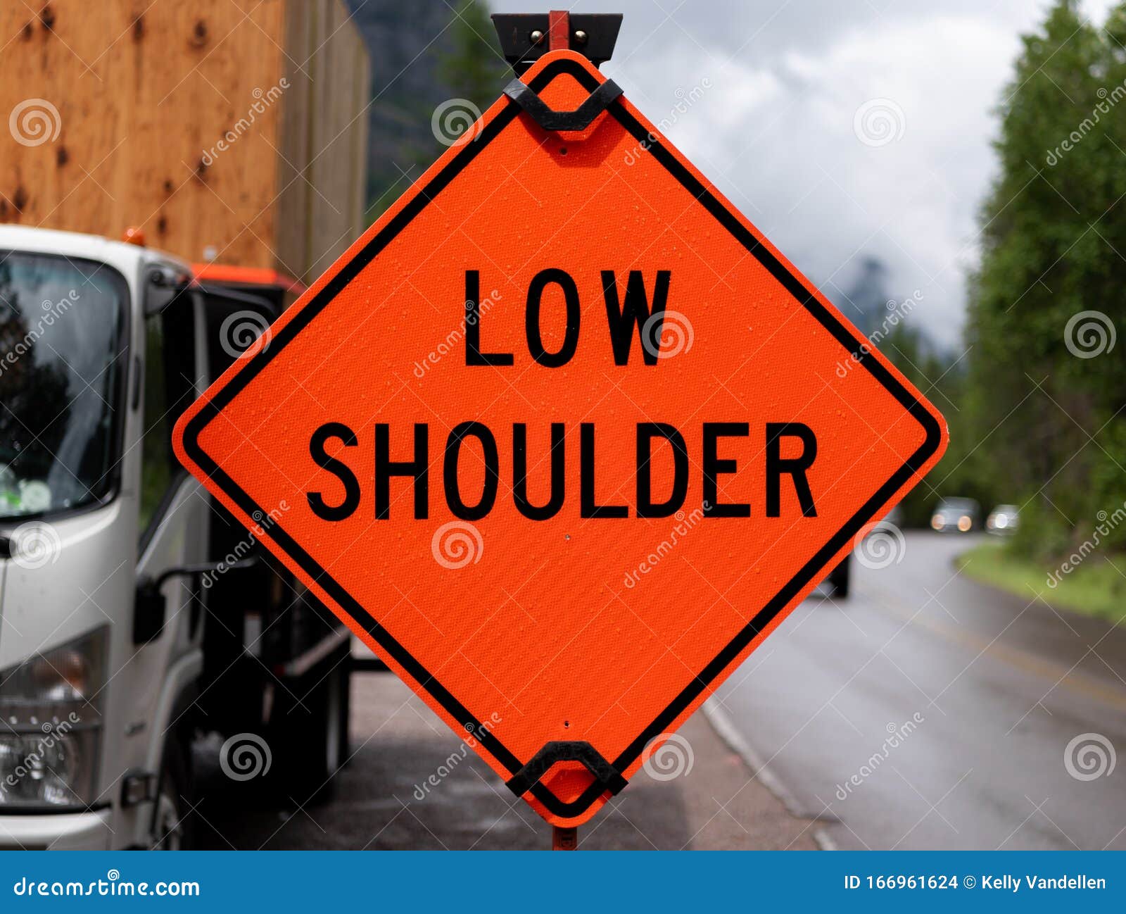 Low Shoulder Warning Sign stock photo. Image of vehicle - 166961624