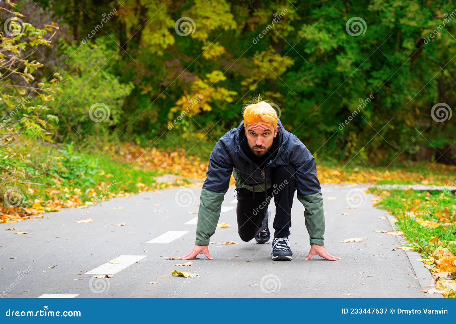 Low Start Runner Prepares To Run Stock Image - Image of motion, asphalt ...