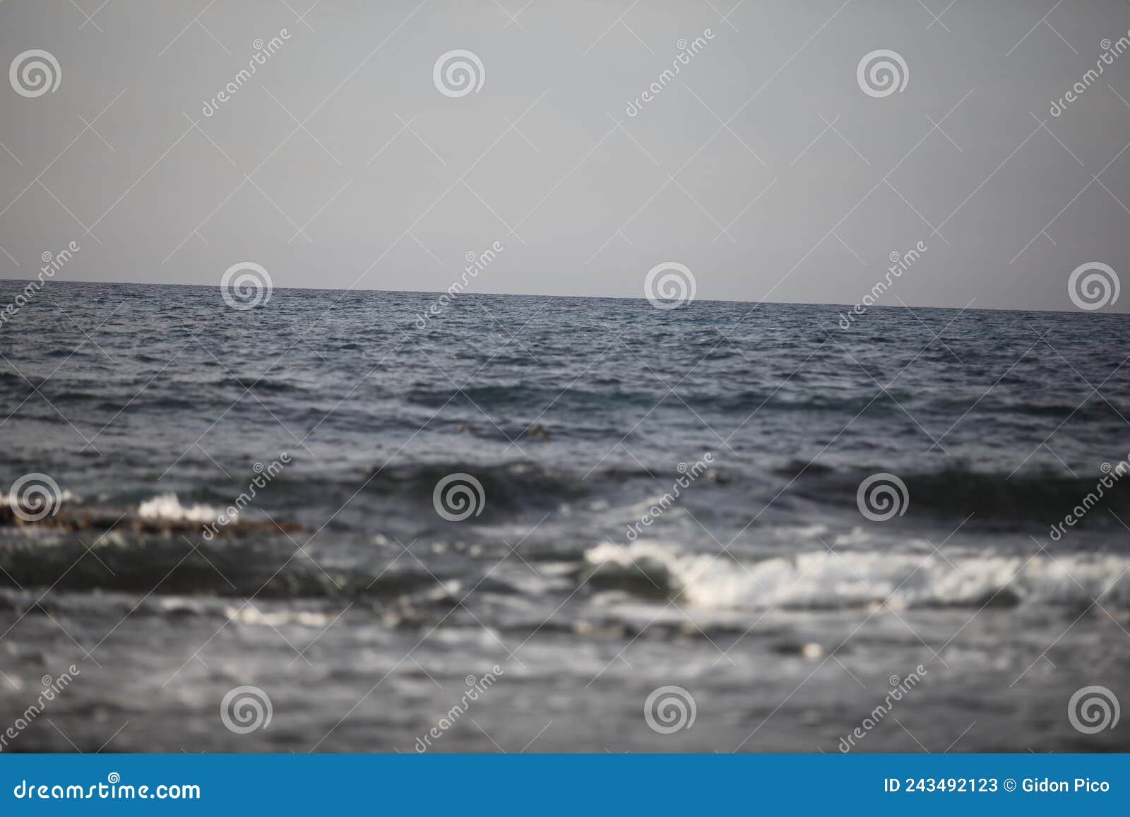 Low Waves on the Shore of a Beach High Quality Stock Image - Image of ...