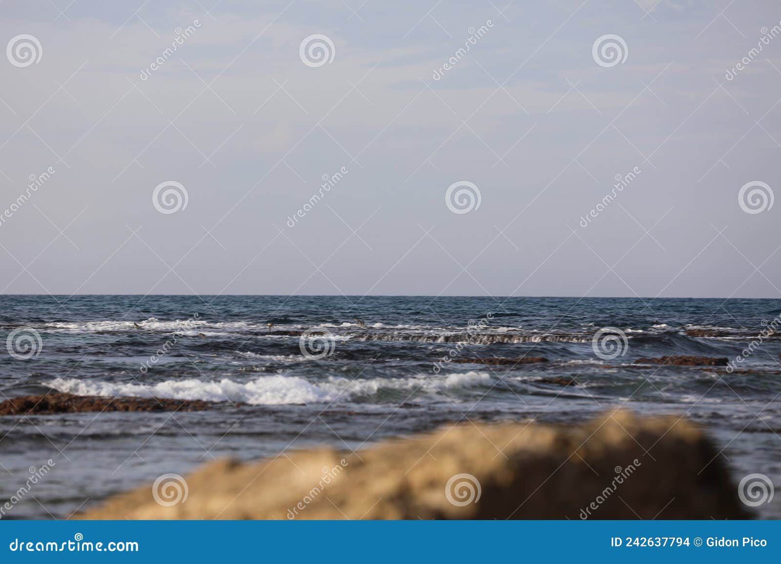 Low Waves on the Shore of a Beach High Quality Stock Photo - Image of ...